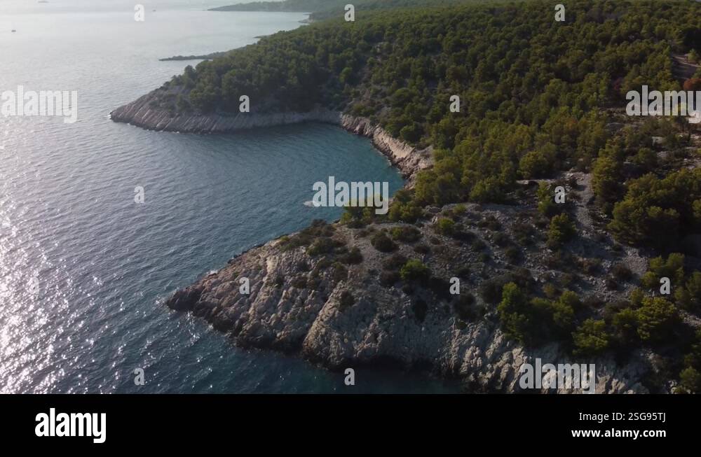Orbit shot around secluded wild beach in Brac island, Croatia ...