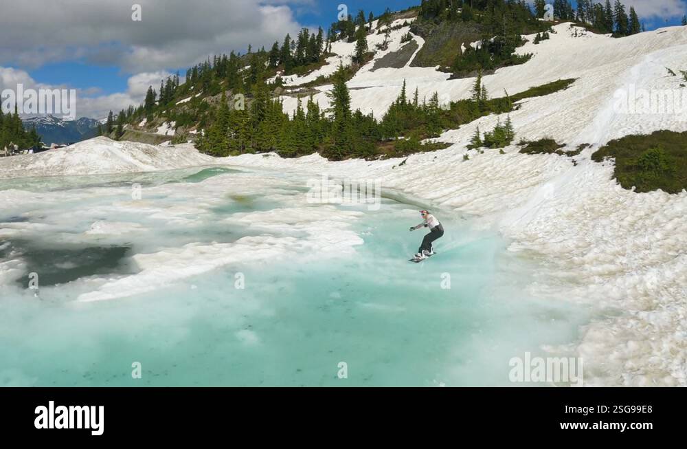 Summer Snowboarding Pond Skim at Mt Baker Stock Video Footage - Alamy