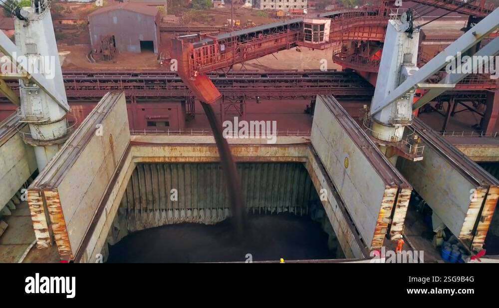 Shiploader Machine Loading The Freight Barge With Iron Ore Mineral At ...