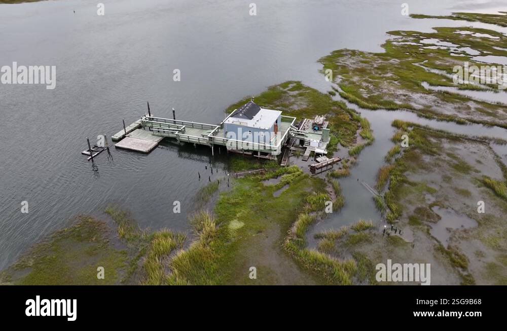 An aerial drone view over the salt marshes in Hempstead, NY on a cloudy ...