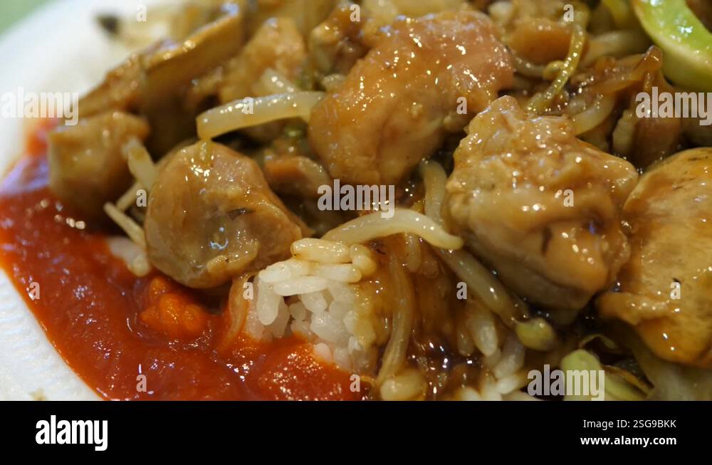 Pan shot of fried chicken and rice at the food court area with 4k Stock ...