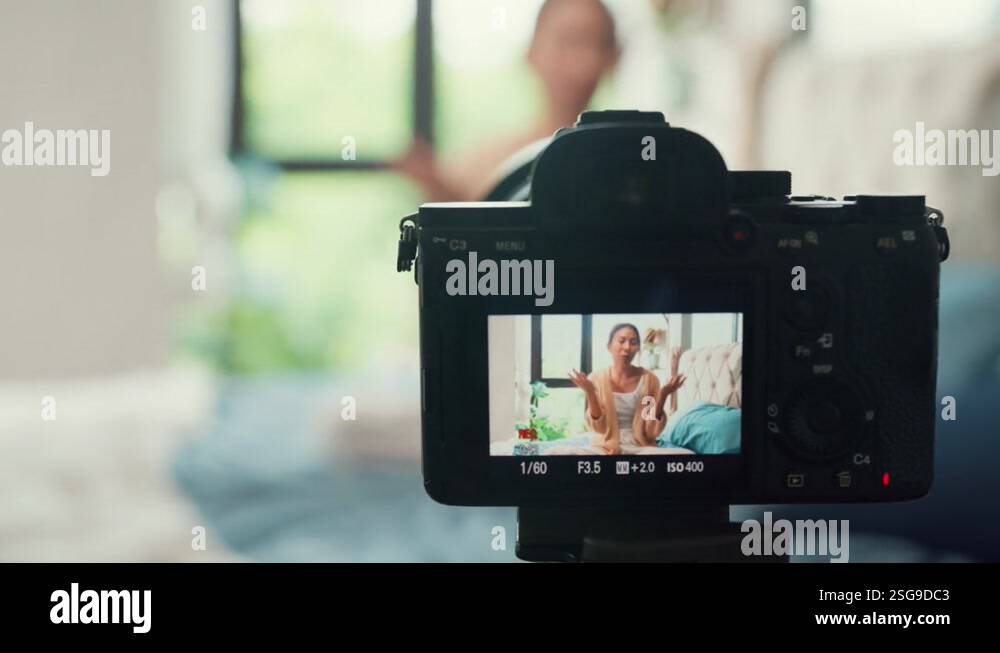 Asia girl influencer recording sharing morning routine in camera sit on ...