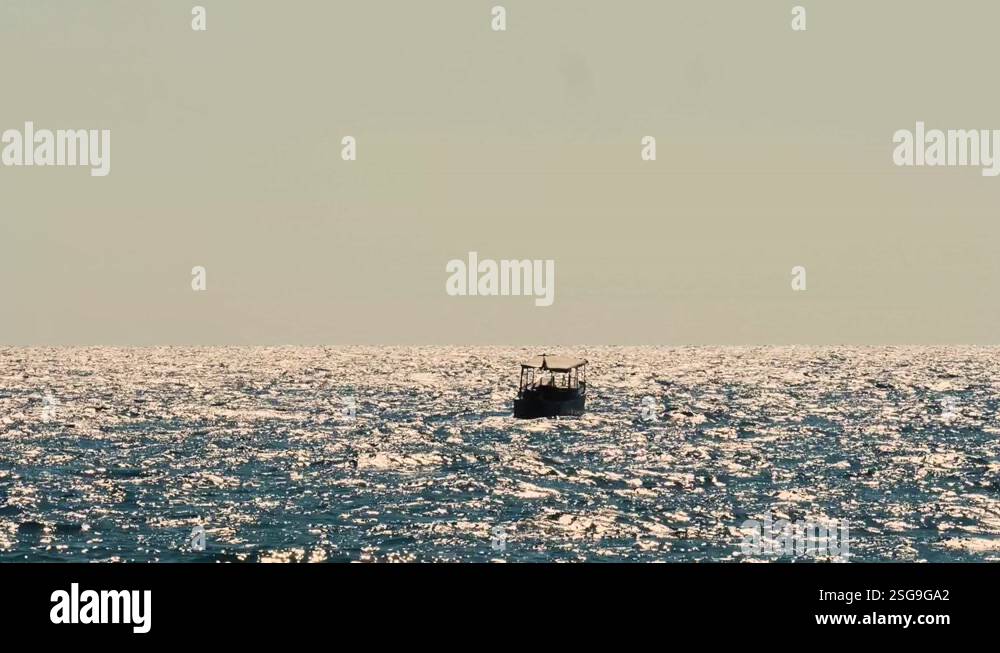 Amazing seascape, motorboat floats in ocean waters. Small boat floats ...