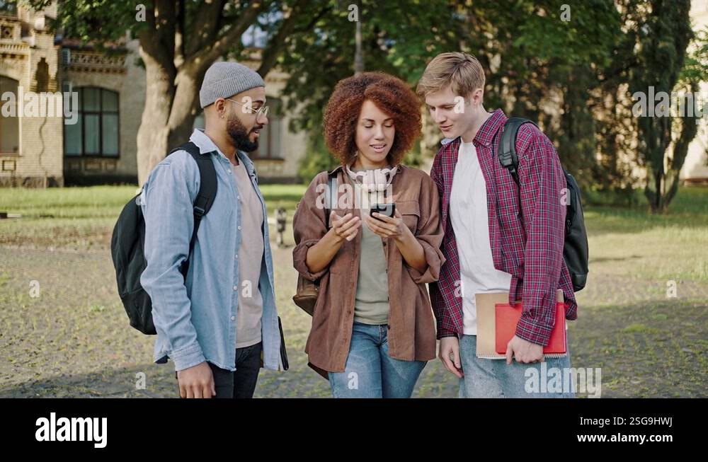 Multiracial students try luck playing gambling games Stock Video ...