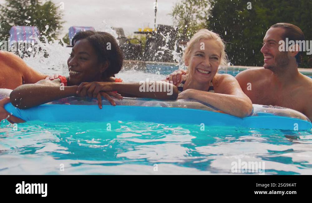 Smiling Family With Mature Parents And Adult Offspring On Summer ...