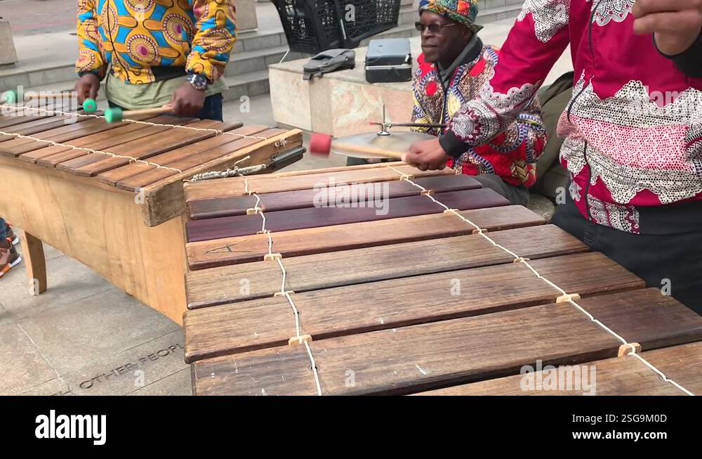 Closeup details, musicians play Marimba and drums at Waterfront Stock ...