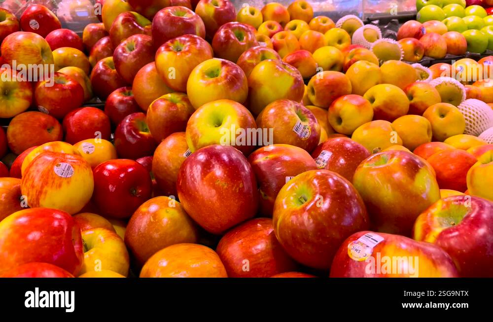 Apples and pears on display in a retail grocery store Stock Video ...