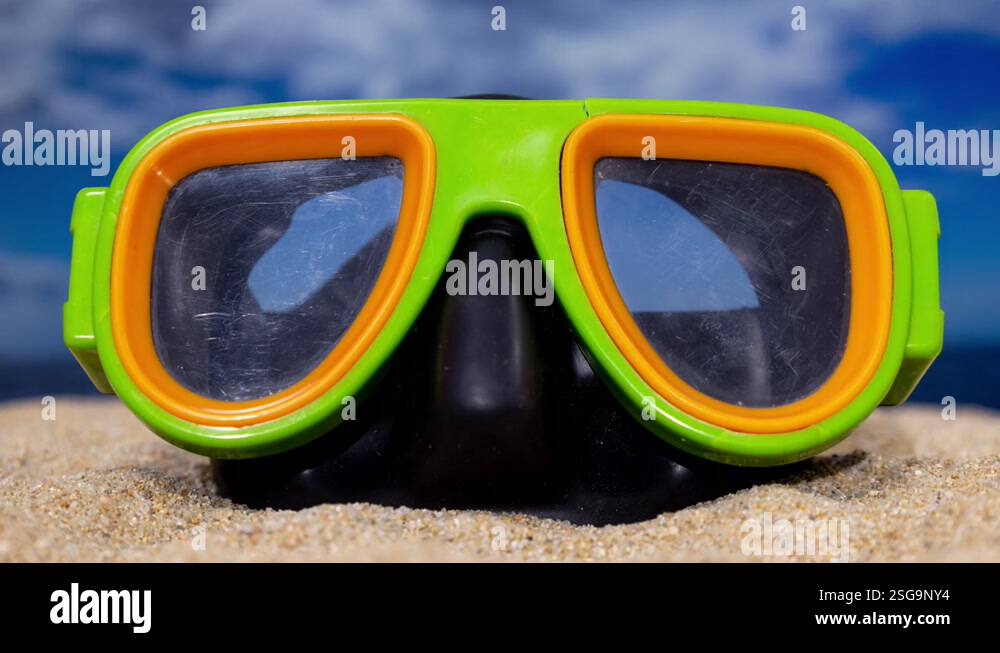 A vintage snorkel mask on the beach Stock Video Footage - Alamy