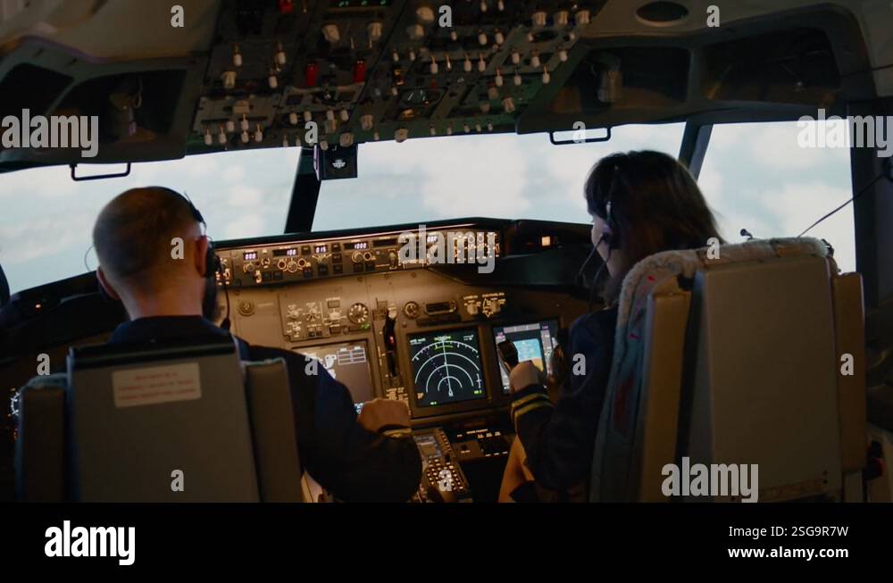 Team of aviators throttling power engine and fixing altitude level Stock Video Footage - Alamy