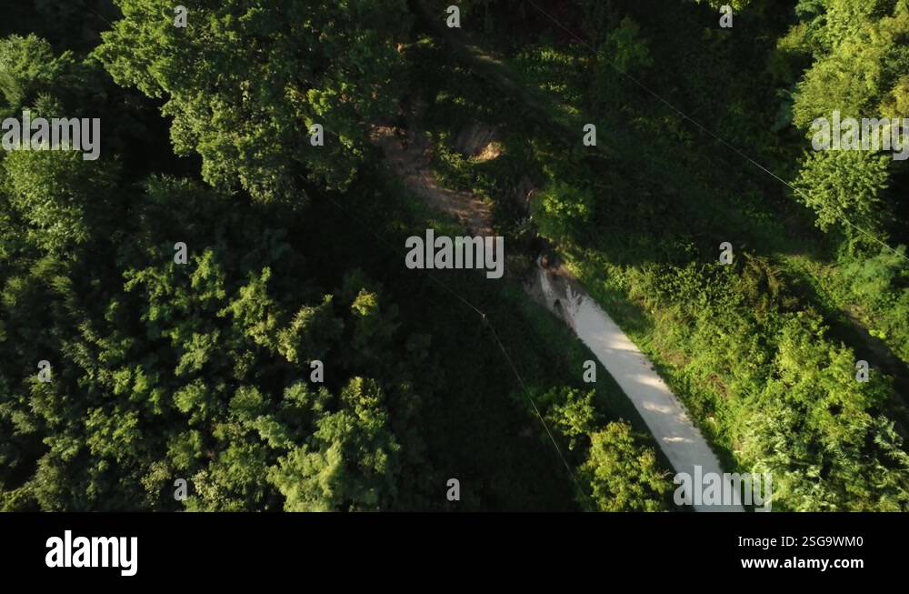 big landslide from above, extreme weather conditions causes natural ...