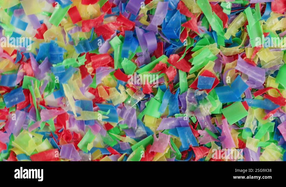 Microplastic pollution, plastic particles top view rotating, garbage ...