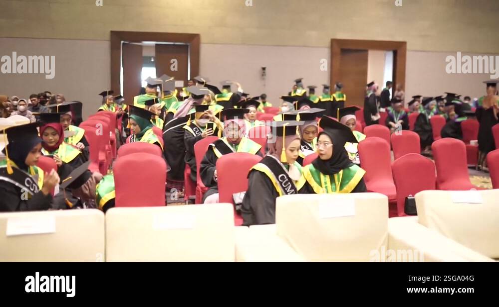 Graduating students attend commencement Stock Videos & Footage - HD and ...