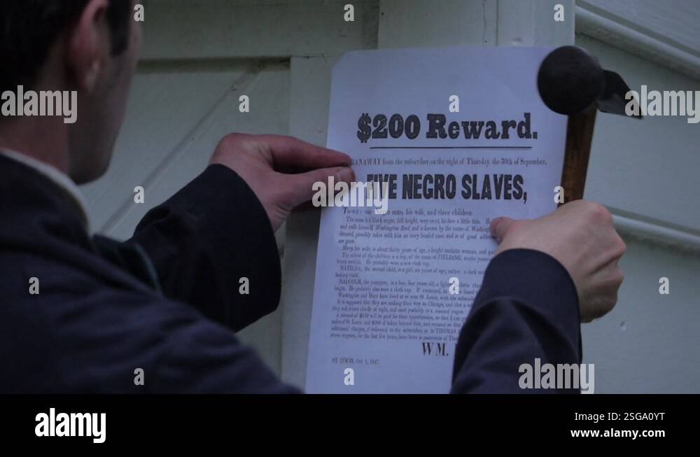 19th Century Man posting a Slavery Notice to a Wall - Slaves Running ...