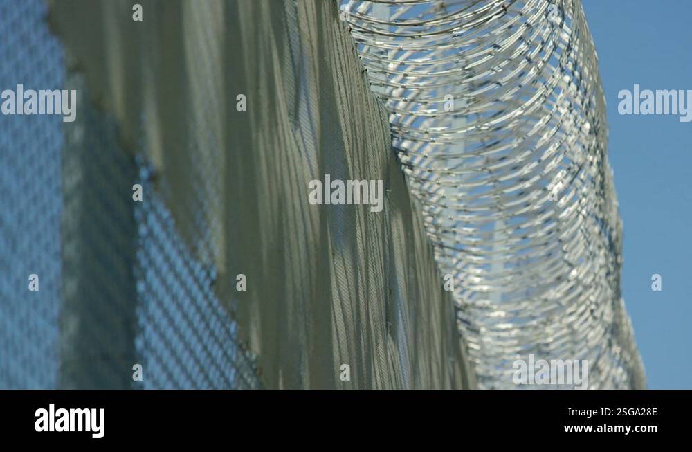 Prison fences or secret military base, detention facility Stock Video ...