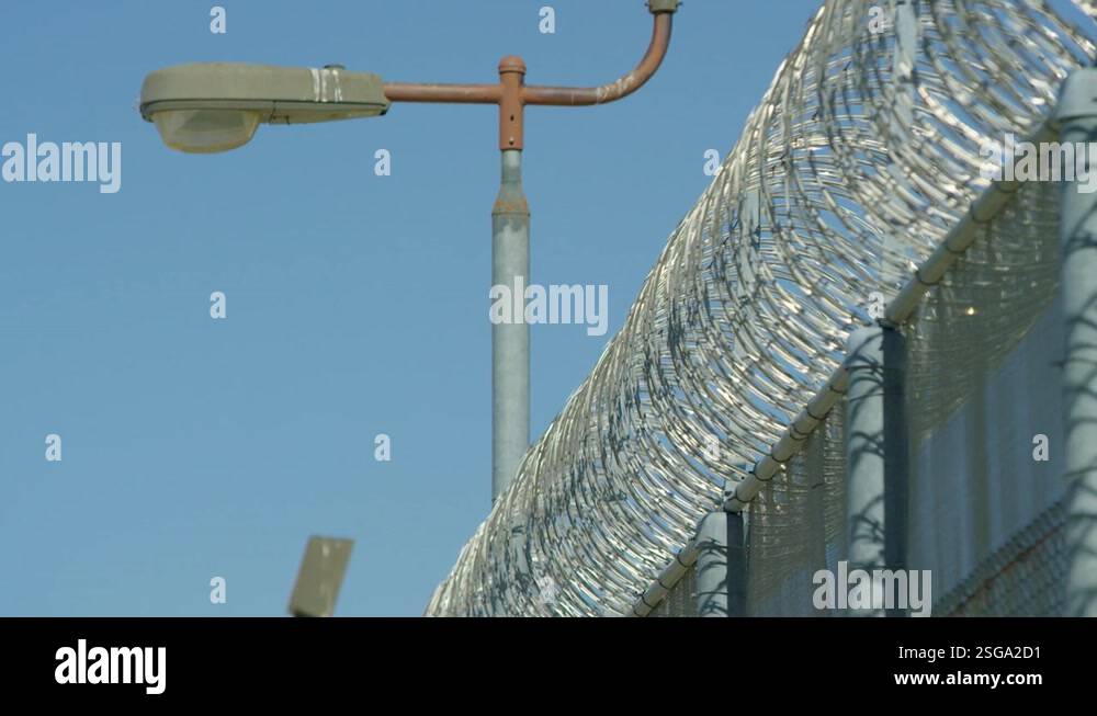 Prison fences or secret military base, detention facility Stock Video ...