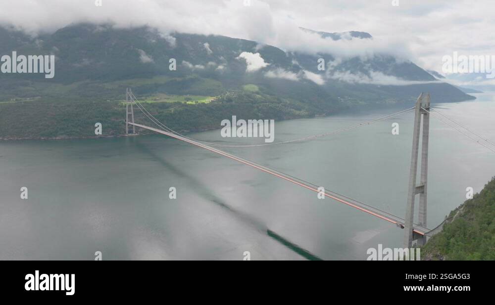 Hardanger Bridge (Hardangerbrua) Spanning The Eidfjorden With Mountain ...