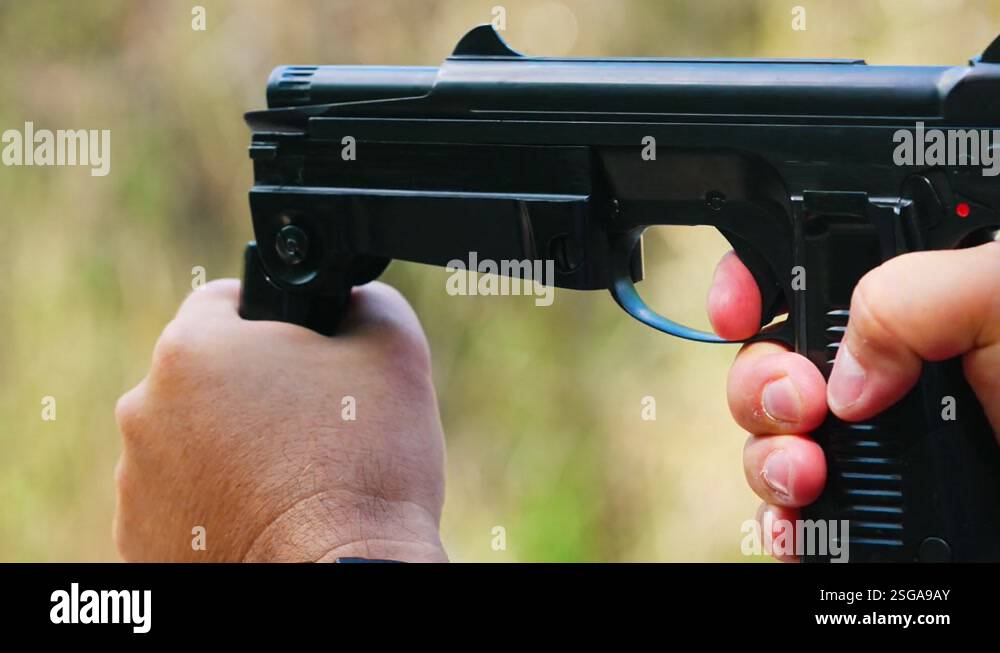 Child holding polish PM Rak submachine gun. Target practice. Firearm ...