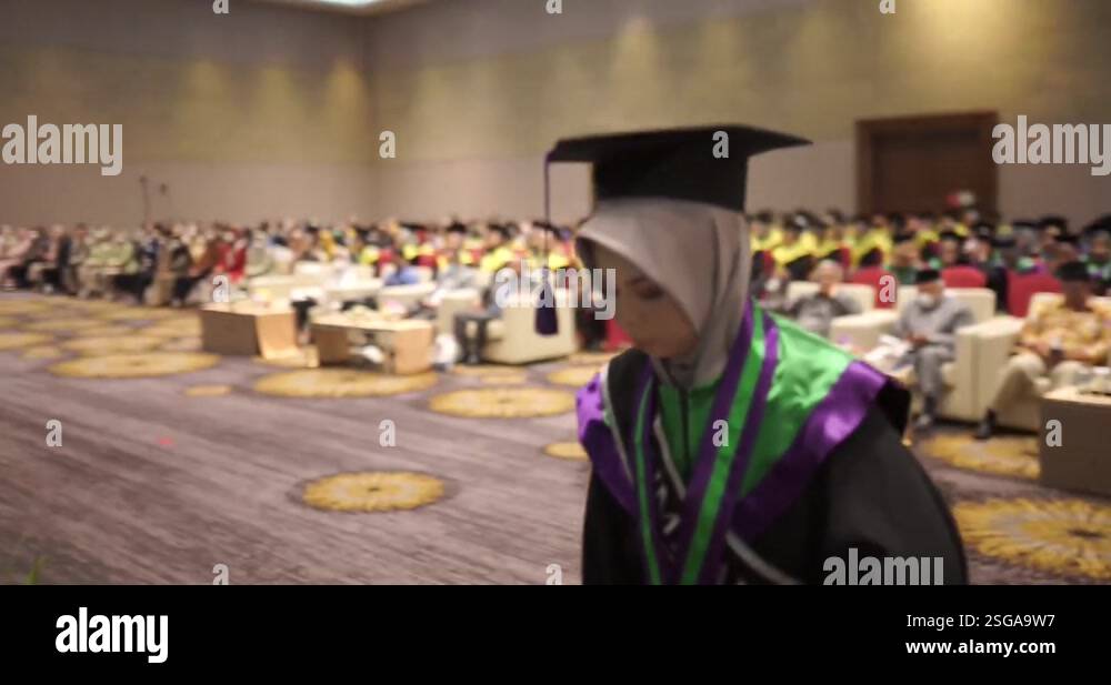 The university graduates line up for degree award in university ...