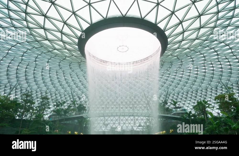 Magnificent vortex with a waterfall inside architecture at Singapore ...