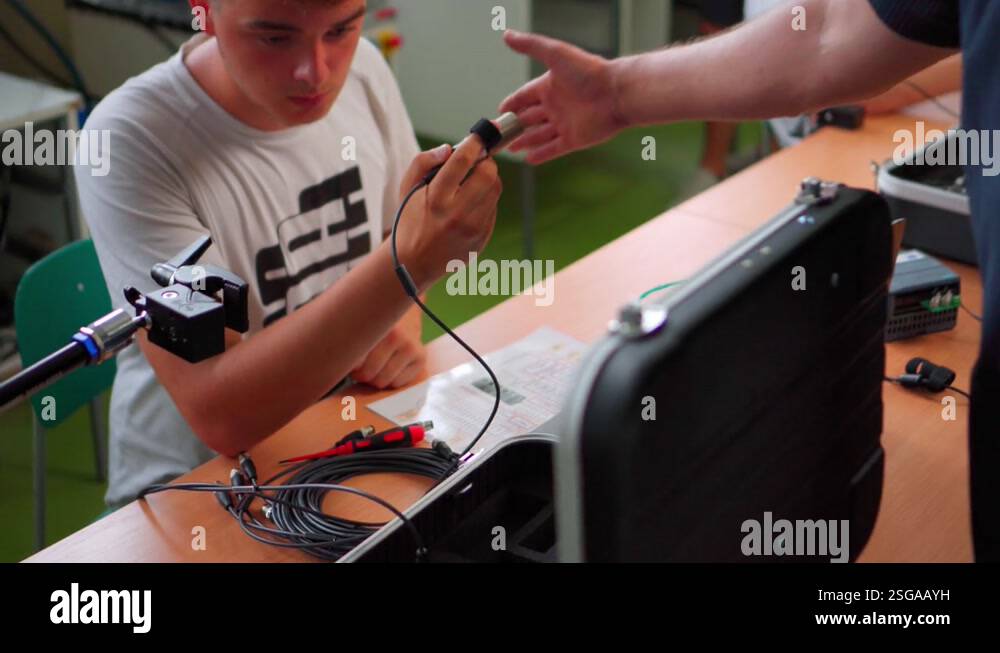 Vocational Education Teacher Teaching Young Students In A Trade School ...