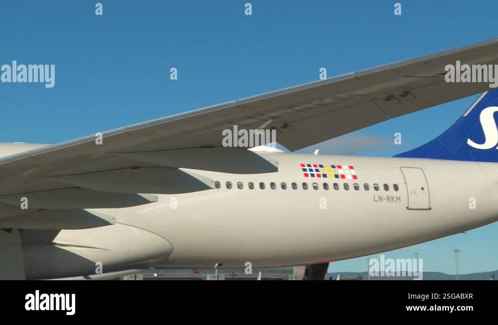 airplane detail close panning left scandinavian airlines airbus 330 on ...