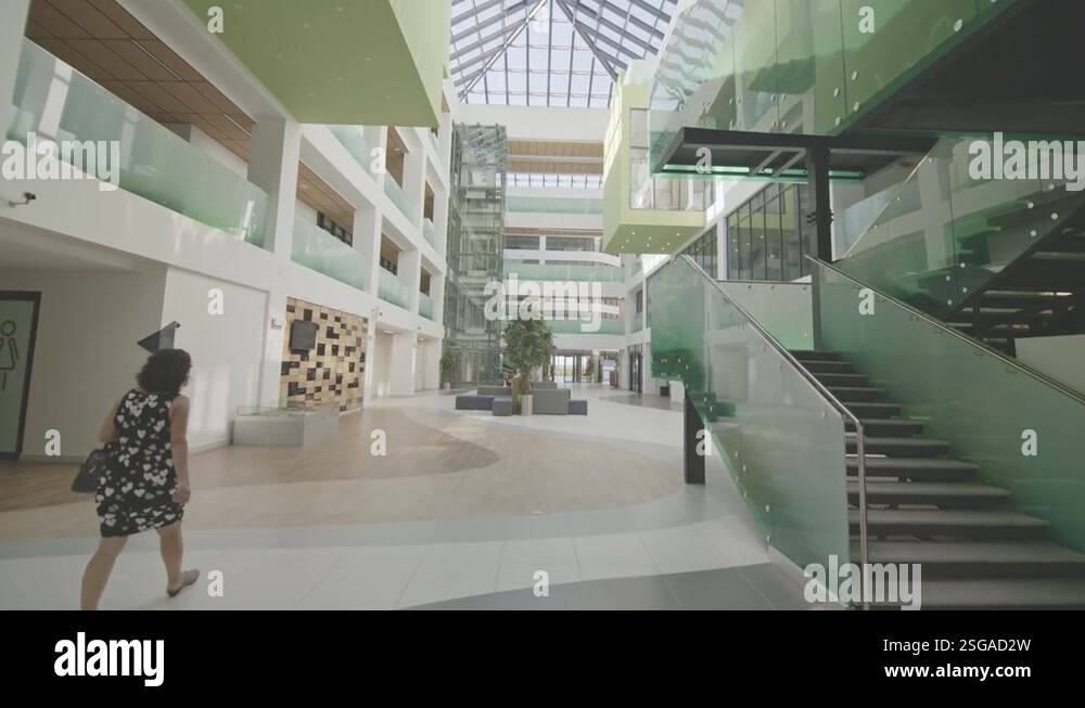 Contemporary shopping mall in green colors with glass roof Stock Video ...
