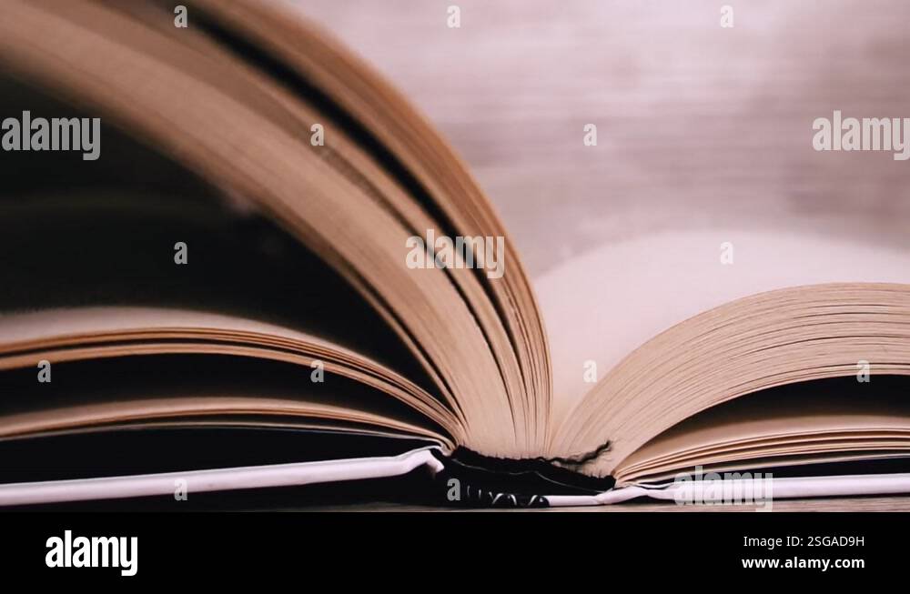 Turning Pages in a White Book Close Up Slow Mo Stock Video Footage - Alamy
