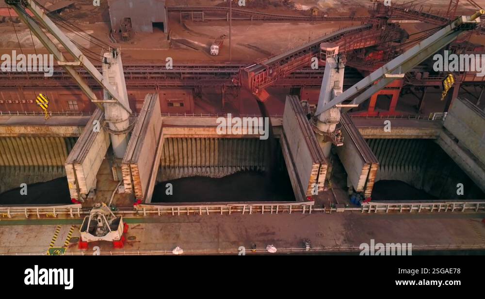 Aerial View Of Conveyor Loading Coal Into The Holds Of Bulk Carrier At ...