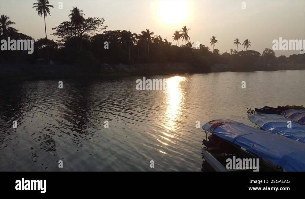 Dolly scene of a latin american river going through a river at dawn ...