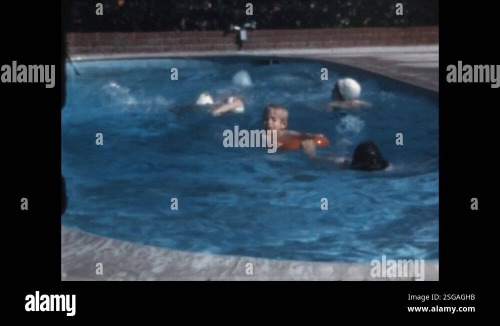 Playing in the Pool 1971 Stock Video Footage - Alamy