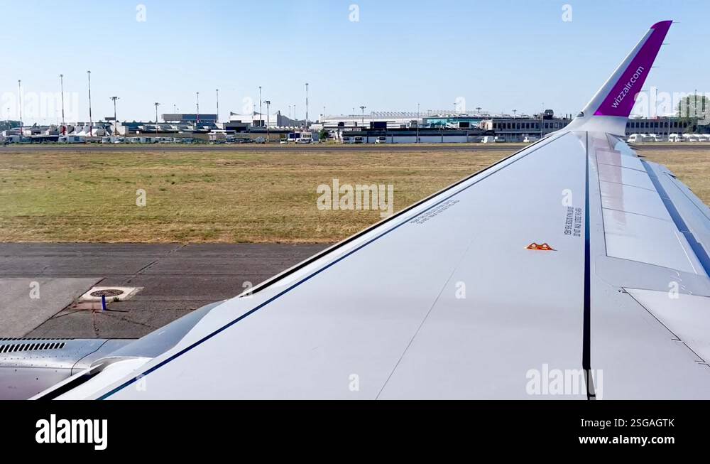 Wizzair jet airplane landing in Rome Fiumicino airport in Italy ...