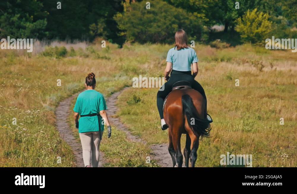 Back View Young Woman Riding Horse in Countryside, Horseback Riding ...