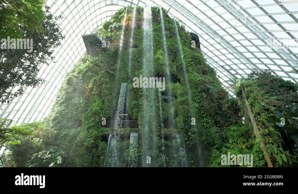 Waterfall inside of the Cloud Forest Dome at Gardens by the Bay in ...
