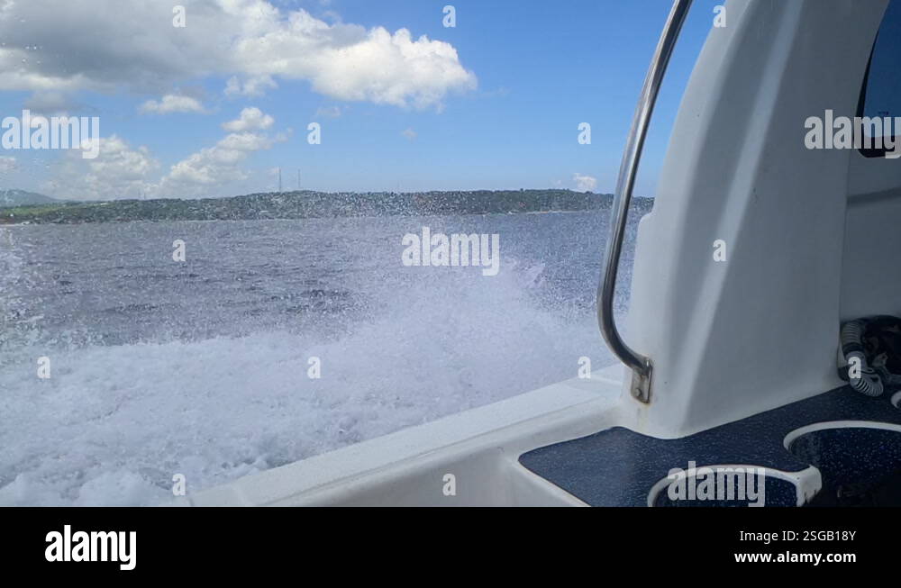 Slow Motion of Waves and Speed Boat Sailing in Ocean Water by Tropical ...