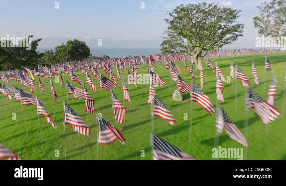 Drone shot of Waves of Flags display along Pacific Coast Highway in ...