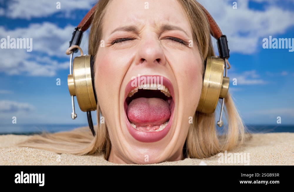 Woman buried in sand on beach Stock Video Footage - Alamy