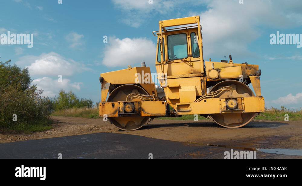 Road roller - compactor-type engineering vehicle used to compact soil ...