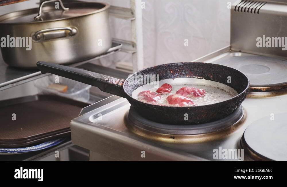 Red meat chicken liver frying on hot boils oil pan Stock Video Footage ...