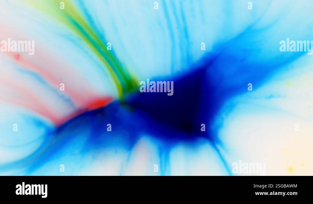 Moving background consisting of blue, red and green particles of the ...