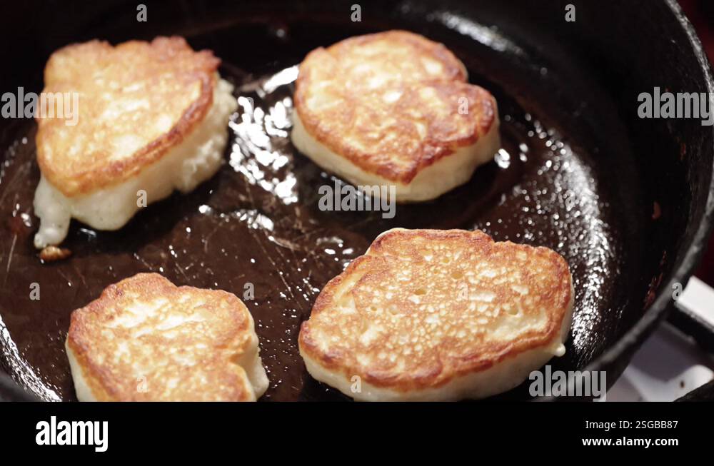 Cooking Fried Cheesecakes Close-up In A Frying Pan. Traditional Cottage ...