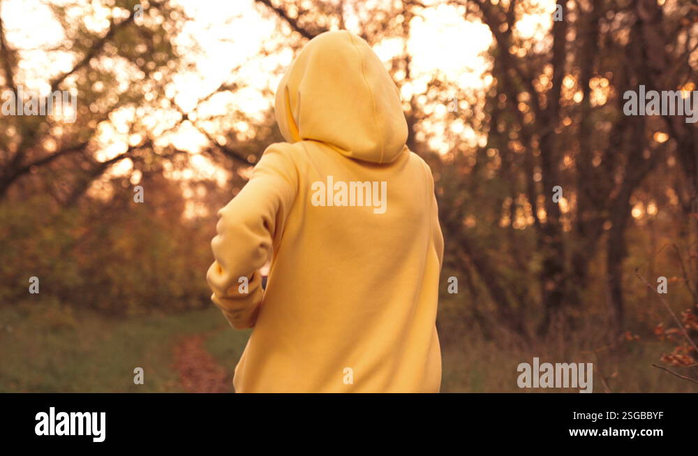 young girl run autumn forest. sun glare bokeh. lose weight while ...