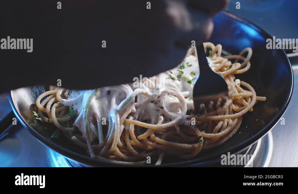 Stirring Protein-rich Greek Yogurt Spaghetti Served In A Plate. close ...