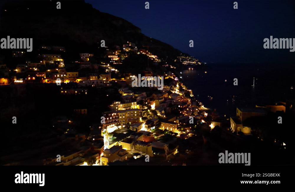 Evening aerial views of the tourist town of Positano on the Amalfi ...