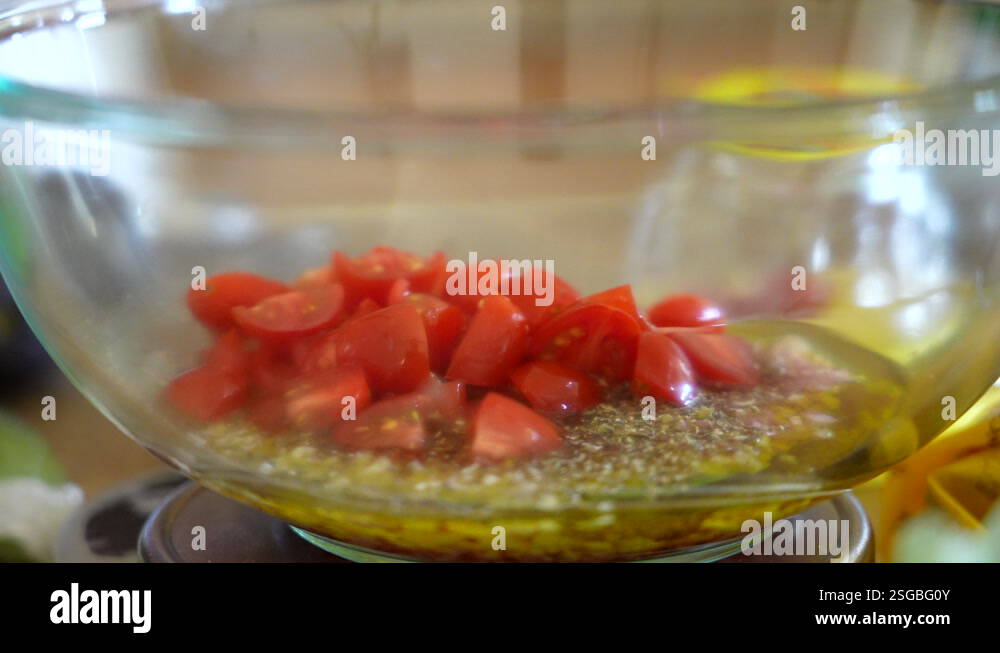 Adding fresh, chopped tomatoes to the homemade olive oil, vinegar, and ...