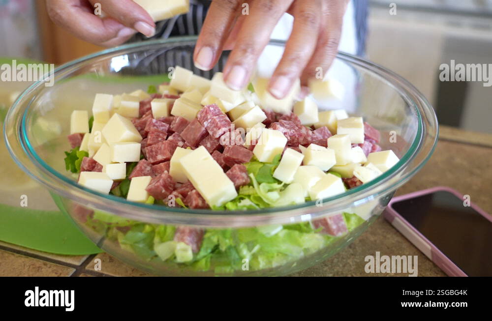 Adding provolone cheese to a chopped salad - ANTIPASTO SALAD SERIES ...