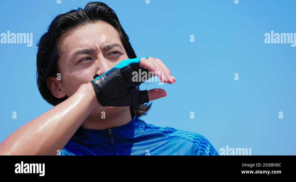 asian man sweating Stock Video Footage - Alamy