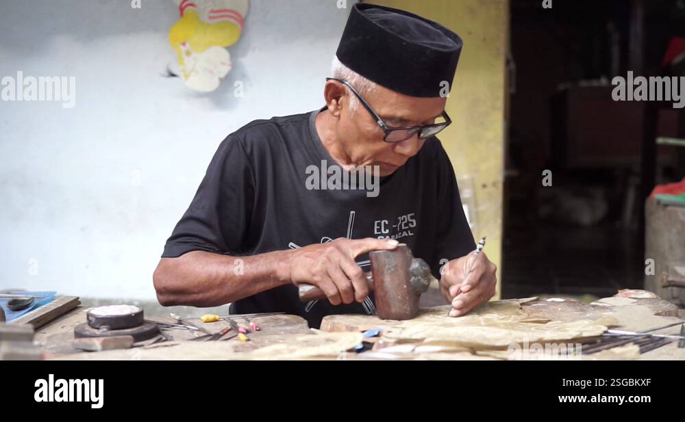 Process of making Wayang shadow puppet. Wayang kulit is a traditional ...