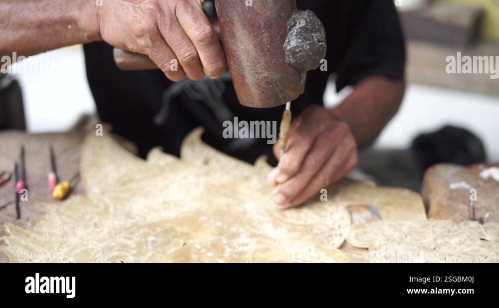 Process of making Wayang shadow puppet. Wayang kulit is a traditional ...