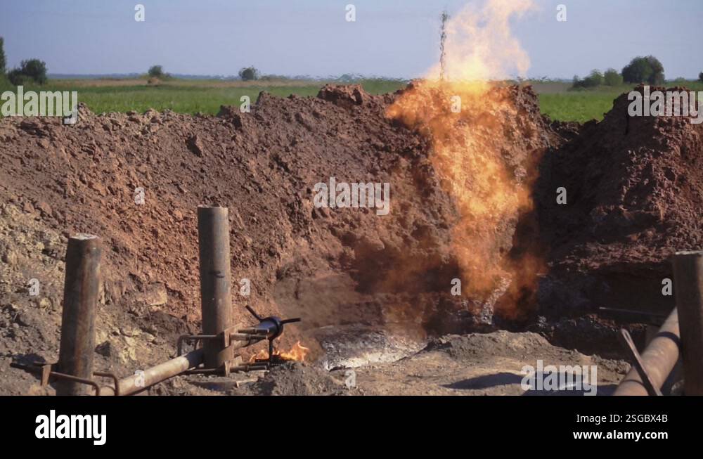 Horizontal view of fire and tubes in oil refinery and gas processing ...