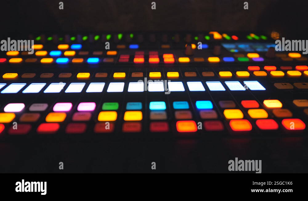 Brightly glow buttons and green color equalizer on professional sound ...